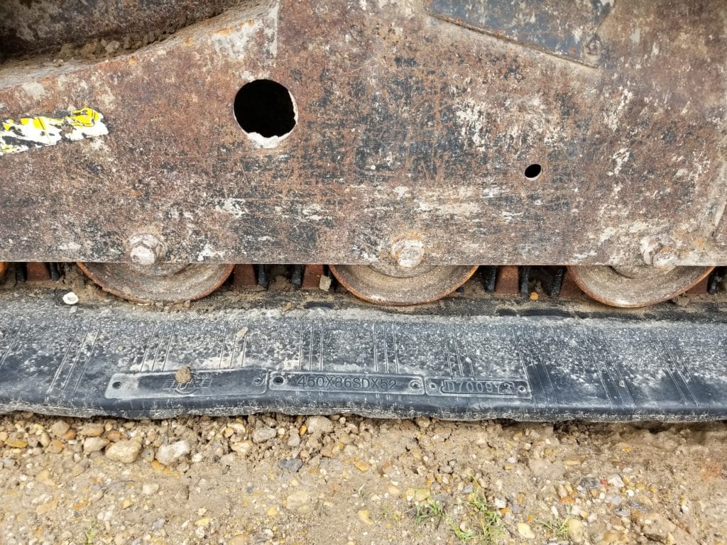 USED BOBCAT T650 SKID STEER BOTTOM ROLLERS - Gulf South Equipment Sales